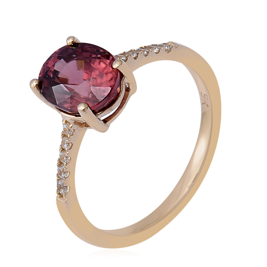 Tanzanian Rose Zircon and White Zircon Solitaire Ring in 9K Yellow Gold ...